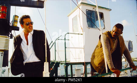 JEFFREY DEAN MORGAN as Clay and IDRIS ELBA as Roque in Warner Bros ...