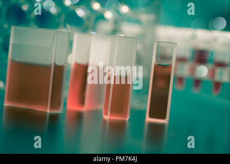 Quartz cuvette with the sample liquid for measurement Stock Photo - Alamy