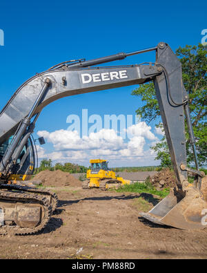 Excavator ; heavy construction equipment ; boom ; dipper ; bucket ; cab ...