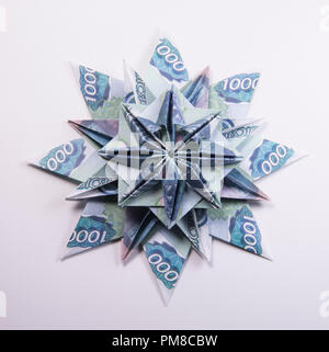 Money Origami snowflake Stock Photo - Alamy