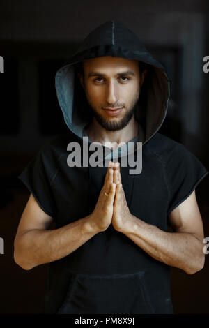 Portrait of Invisible man in the hood isolated on black background ...