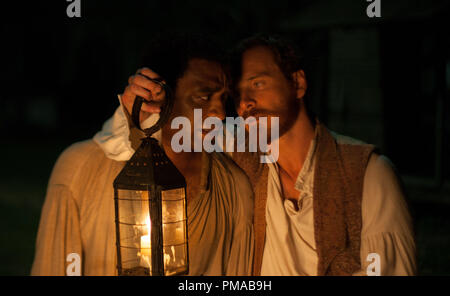 Michael Fassbender as 'Edwin Epps' and Chiwetel Ejiofor as 'Solomon ...