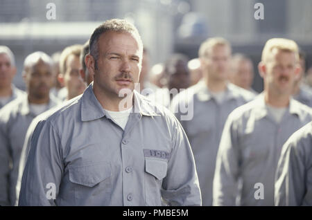 Prisoner Beaupre (BRIAN GOODMAN) assembles with his fellow inmates ...