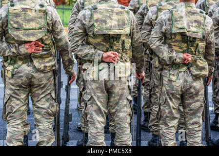 Soldiers stand in row with gun in hand. Army, Military Boots lines of ...