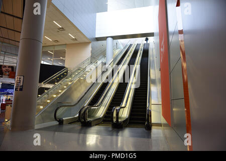 escalators in airport walkway Stock Photo - Alamy
