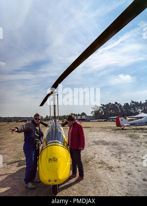 Gifhorn, Germany, September 16, 2018: gyrocopter behind th back part of ...
