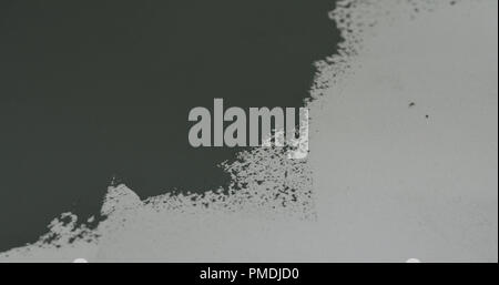 closeup applying micro concrete plaster coating on the floor Stock ...