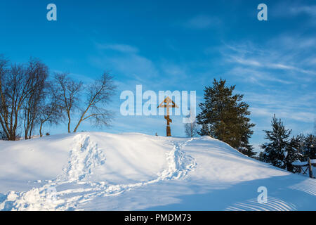 Poklonniy cross on Holy Irinarkhovo spring in a sunny winter day near ...