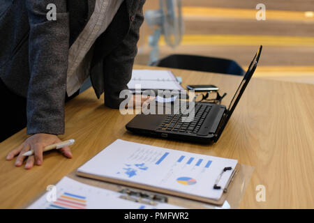woman thinking working organizing plan, analyzing document at workplace ...