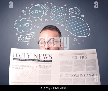Puzzled young businessman reading daily newspaper with speech bubbles ...