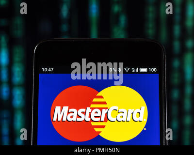 Mastercard new logo seen displayed on smart phone. The company ...