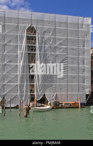 Construction site scaffolding in Venice canal Stock Photo - Alamy