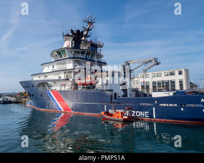 The tug boat of open sea " the Bee Bourbon " moored in the port of ...