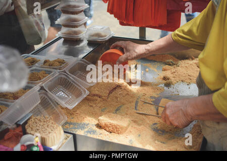 Delicious sweet mochi with peanuts sold at a street stall in Kuala ...