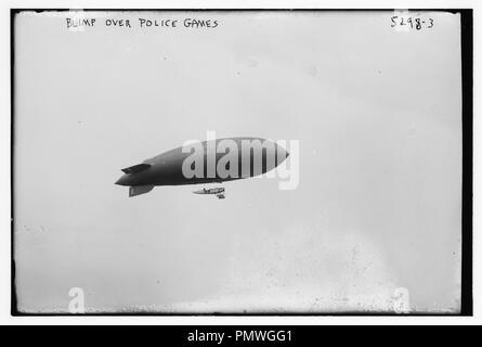 Blimp over police games Stock Photo - Alamy