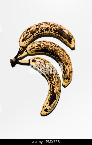 BANANAS AGAINST WHITE BACKGROUND Stock Photo - Alamy