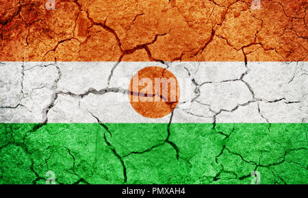 Niger flag cracked. Patriotic background. National flag of Niger Stock ...