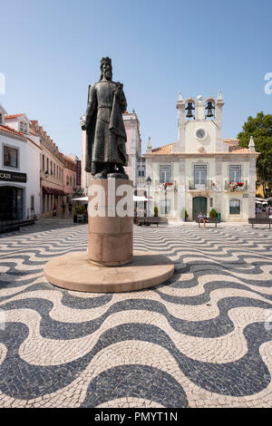 A plaza in Cascais, Portugal, with statue of monarch Dom Pedro I Stock ...