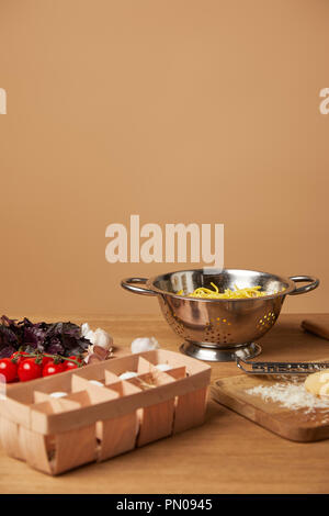 Chicken eggs in colander on table Stock Photo - Alamy