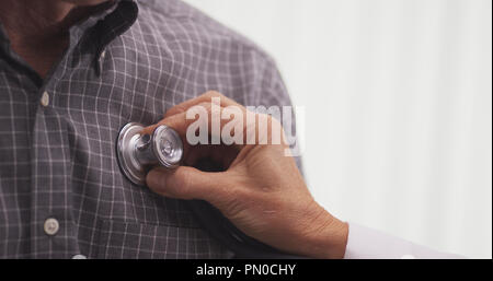 Close-up of doctor checking patient's vitals Stock Photo - Alamy