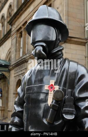 Citizen Firefighter sculpture with a poppy tribute for the 10th ...