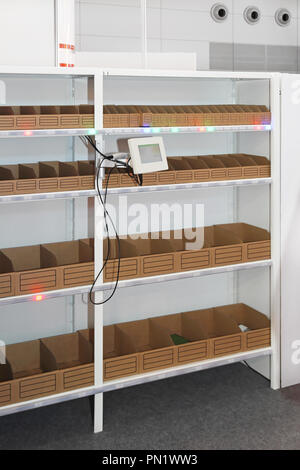 Sorting Trays Shelf Stock Photo - Alamy