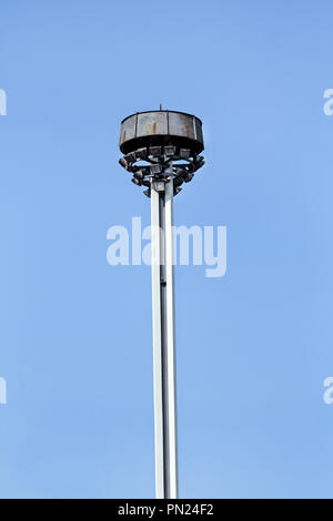Spot-light tower at the road on blue sky background Stock Photo - Alamy