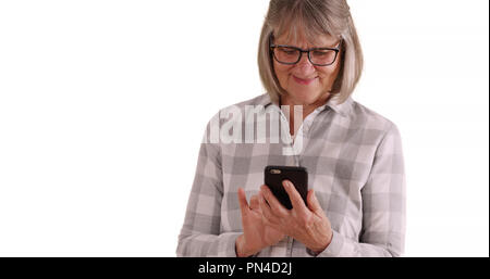 Old lady texting someone using her cell phone Stock Photo - Alamy