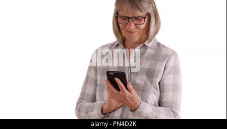 Old lady texting someone using her cell phone Stock Photo - Alamy