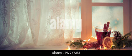 mulled wine on the background of a window with an autumn entoura Stock ...