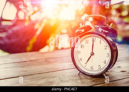Clock face showing time 7 Seven o clock 0700 1900 hrs Stock Photo - Alamy