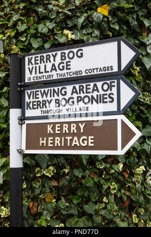 Signposts showing the directions to the Kerry Bog Village and the Kerry ...