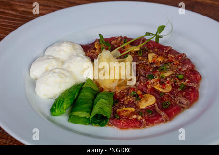 Raw Japanese young Beef carpaccio Stock Photo - Alamy