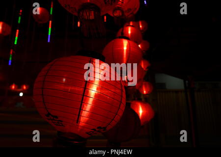 Red lantern glowing at night Stock Photo - Alamy