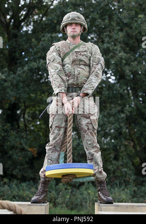 Soldiers demonstrate the vehicle casualty extraction stage in the ...