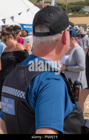 Police Officer wearing body armour with machine gun automatic pistol ...