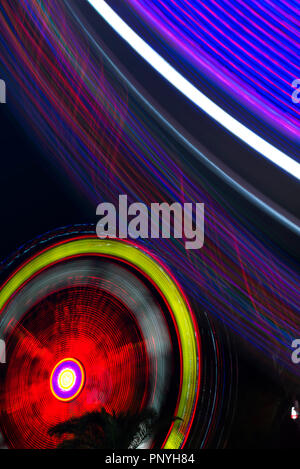 Amusement park long exposure photo Stock Photo - Alamy
