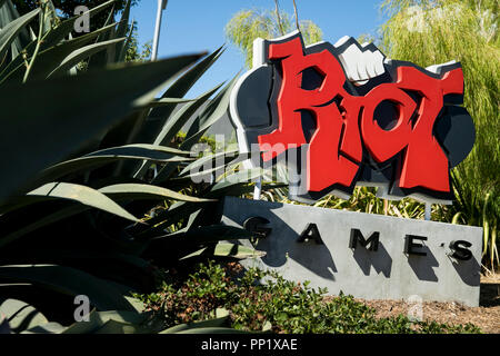 A logo sign outside of the headquarters of Riot Games, Inc., in Los ...