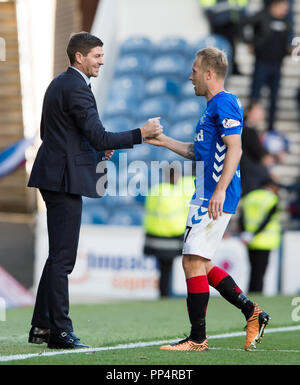 Rangers manager Steven Gerrard shakes hands with Aberdeen's Niall ...
