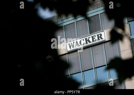 A logo sign outside of the headquarters of Wacker Chemie in Munich ...
