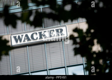 A logo sign outside of the headquarters of Wacker Chemie in Munich ...