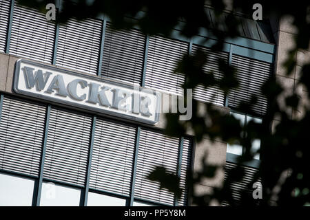 A logo sign outside of the headquarters of Wacker Chemie in Munich ...