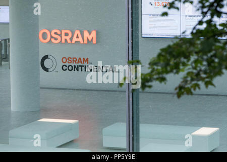 A logo sign outside of the headquarters of OSRAM Licht AG in Munich ...
