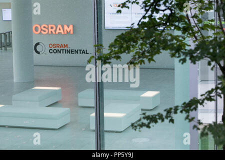 A logo sign outside of the headquarters of OSRAM Licht AG in Munich ...