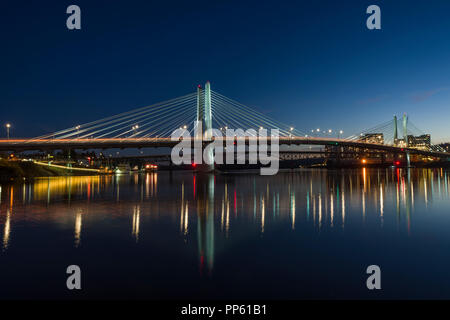Tillicum Crossing bridge over the Willamette River lit up at night ...
