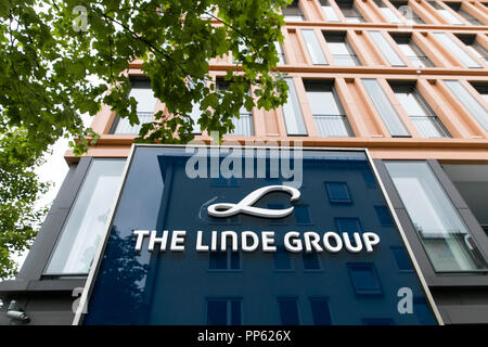 A logo sign outside of the headquarters of The Linde Group in Munich ...