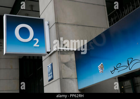 A logo sign outside of a Telefónica Europe 02 retail store in Munich ...