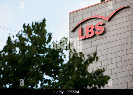 A logo sign outside of the headquarters of LBS Bayerische ...