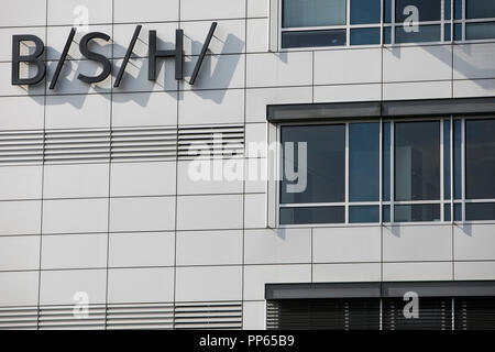 A logo sign outside of the headquarters of BSH Hausgeräte GmbH (BSH ...