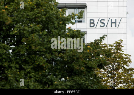 A logo sign outside of the headquarters of BSH Hausgeräte GmbH (BSH ...